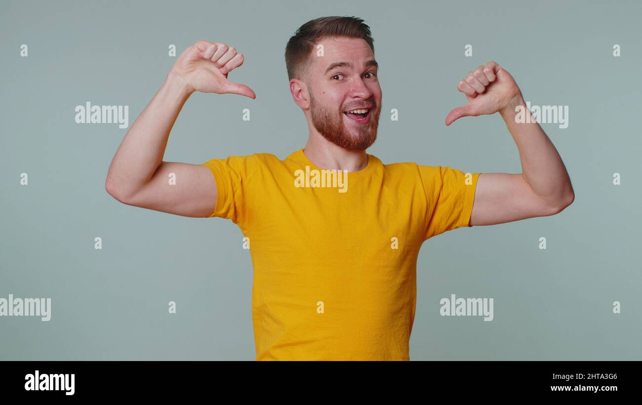I am the best, choose me. Stylish man in t-shirt feeling very proud ...