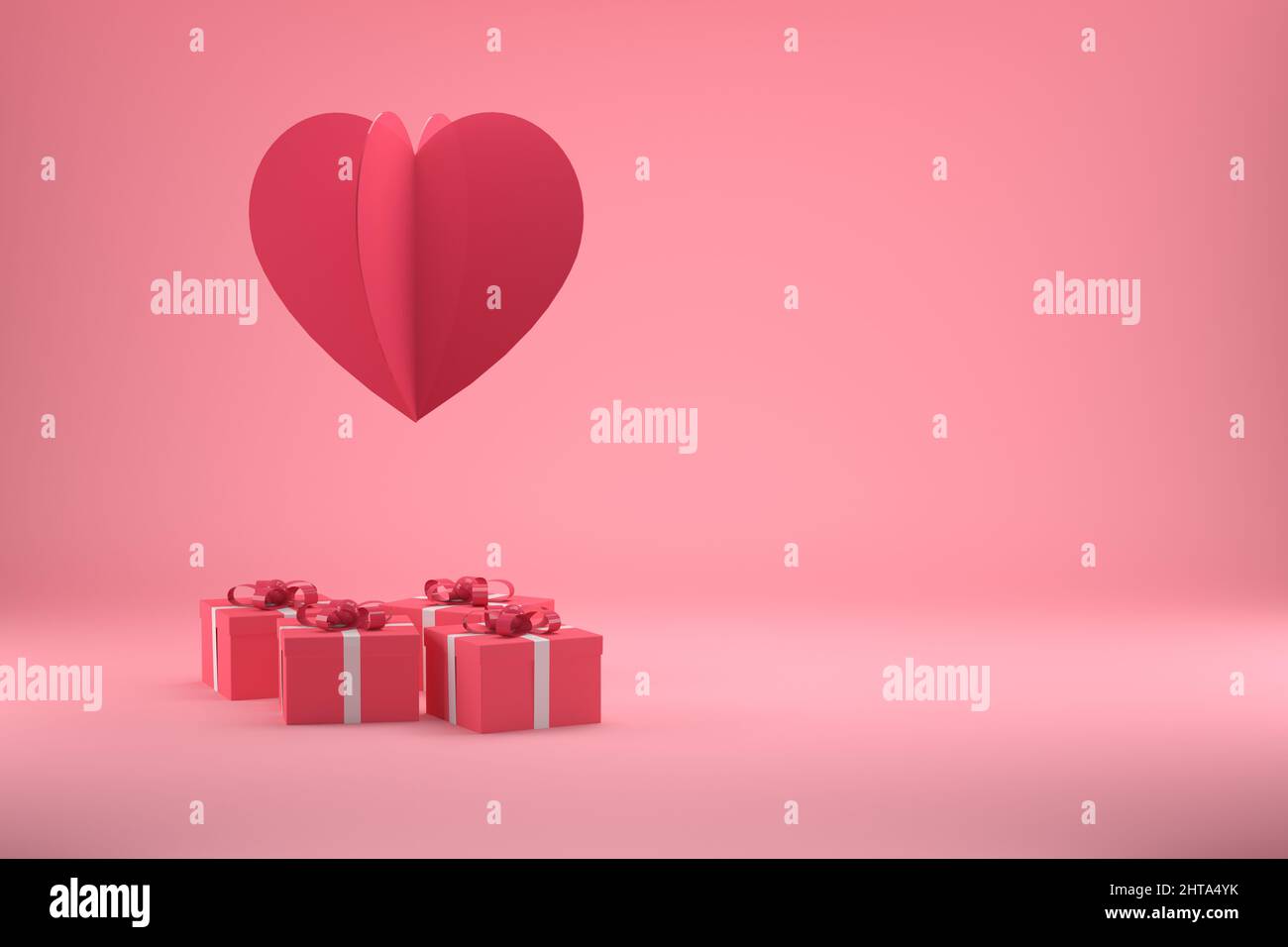 gift boxes and an oversized red heart on a pastel pink for valentines ...