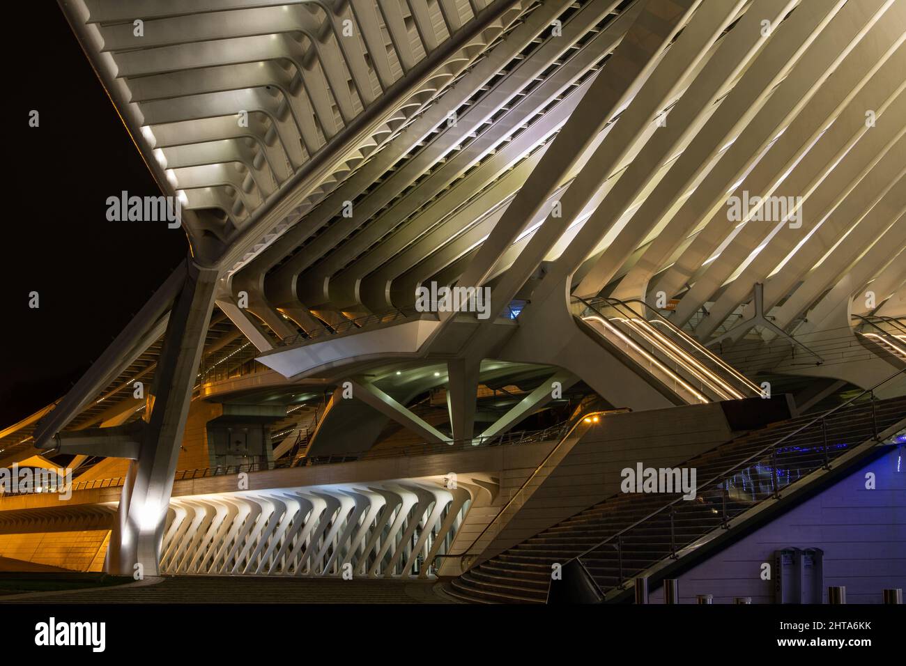 Abstract white lines on top of a building at night Stock Photo - Alamy
