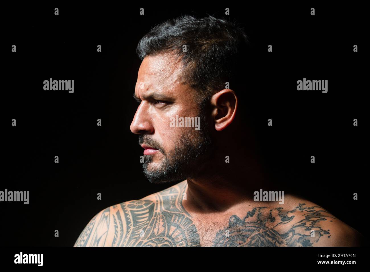 Brutal man, handsome serious male model. Closeup portrait of guy with ...
