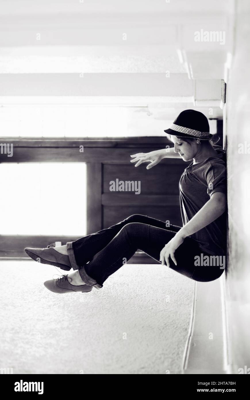 Falling or flying. A woman appears to be floating in the air inside her ...