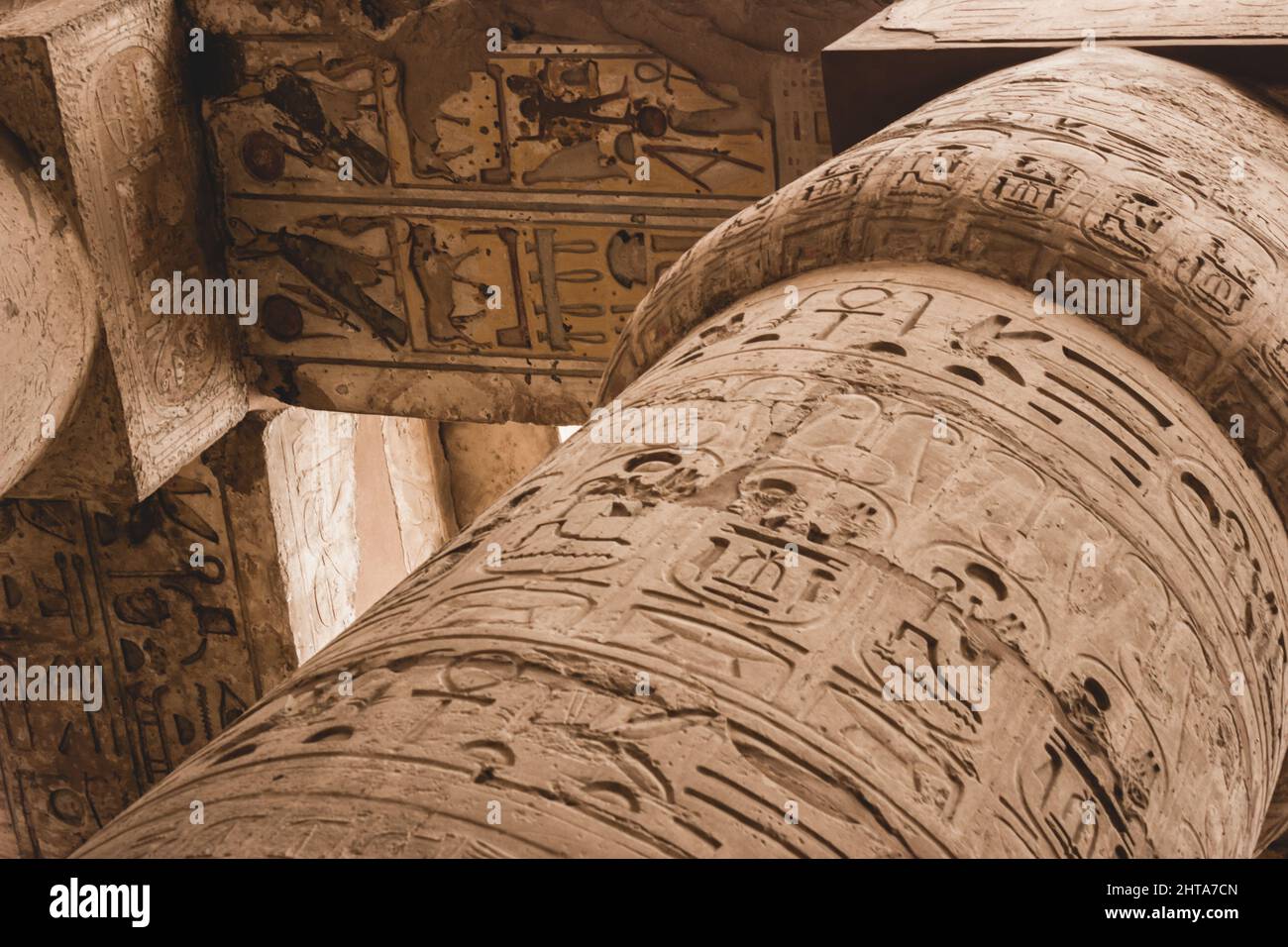 Column with engravings of Egyptian gods and hieroglyphs in Luxor, Egypt ...