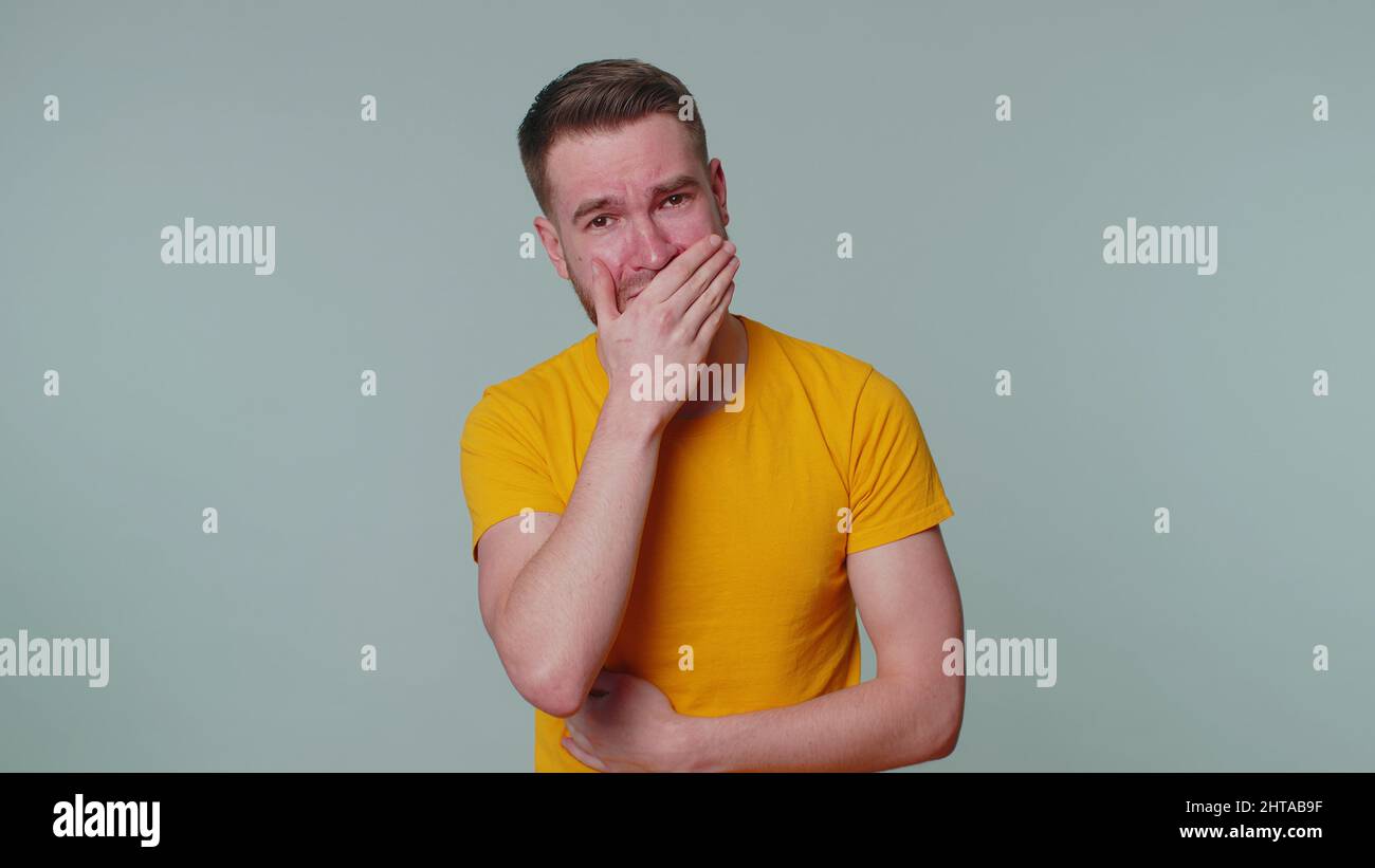 Tired handsome sleepy man yawning, feeling somnolent lazy bored gaping ...