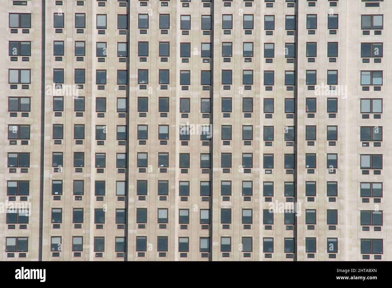 Facade of a building with windows Stock Photo - Alamy