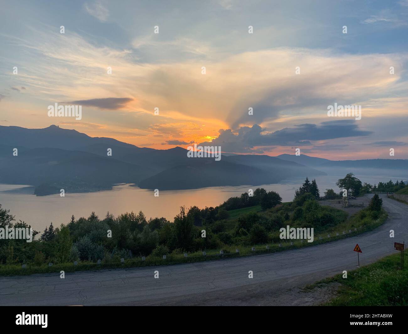 Stunning view of Bicaz Lake and mountains layers silhouette under a ...