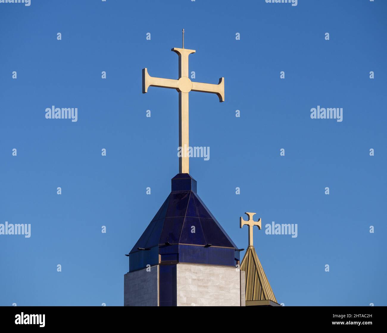 Two church steeples with crosses in Tres Rios, Costa Rica with a clear ...