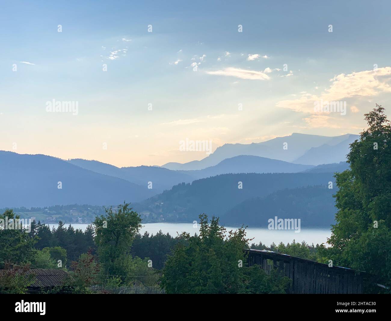Stunning view of Bicaz Lake and mountains layers silhouette under a ...