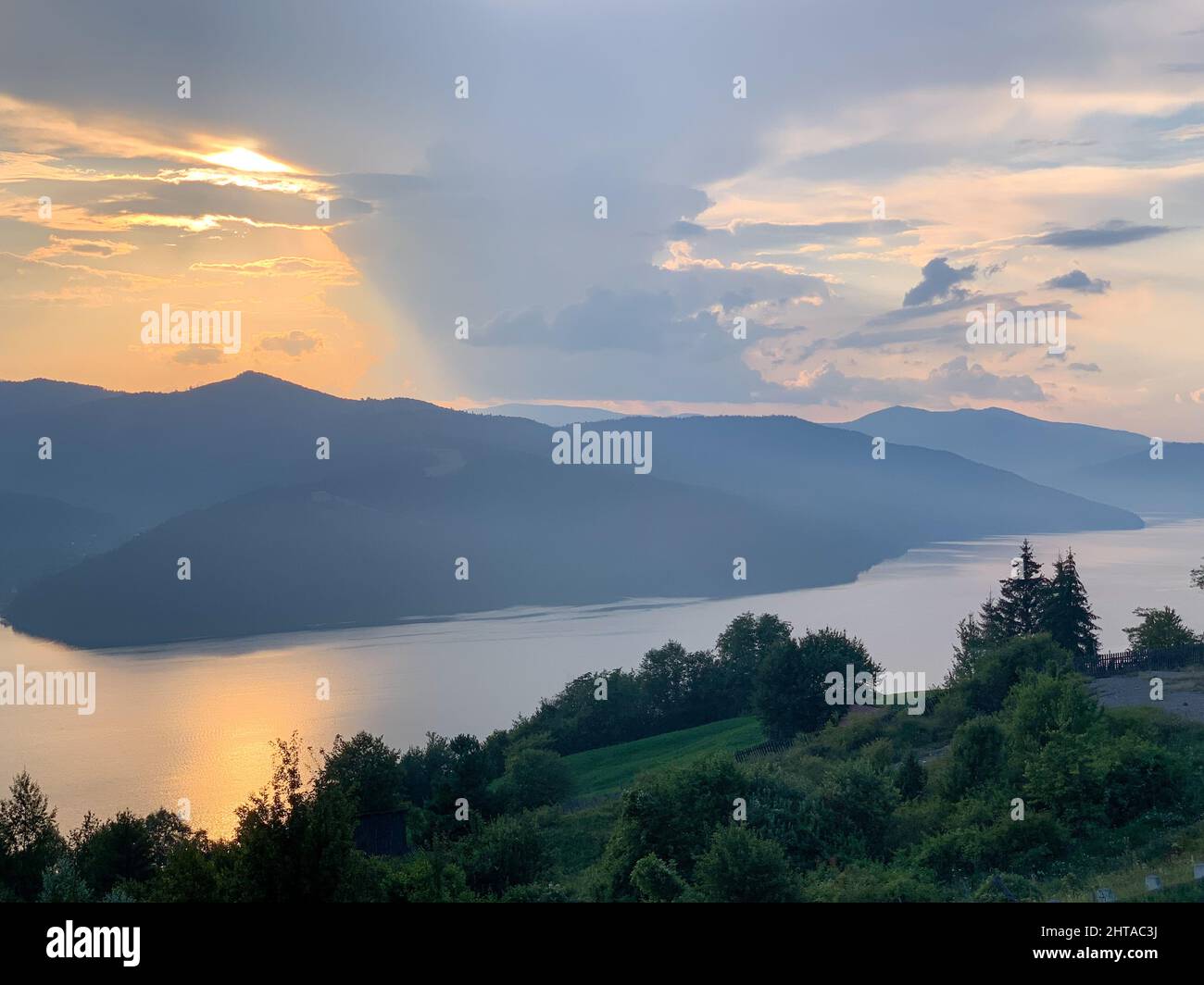Stunning view of Bicaz Lake and mountains layers silhouette under a ...