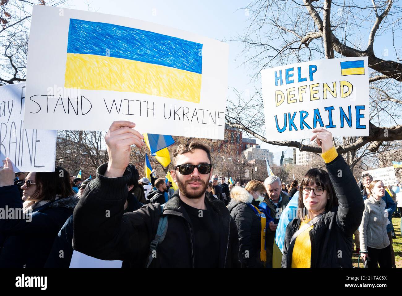 February 27, 2022 - Washington, DC, United States: People holding signs ...