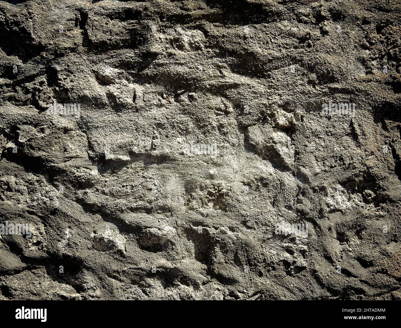 Front view of a stone wall texture Stock Photo - Alamy