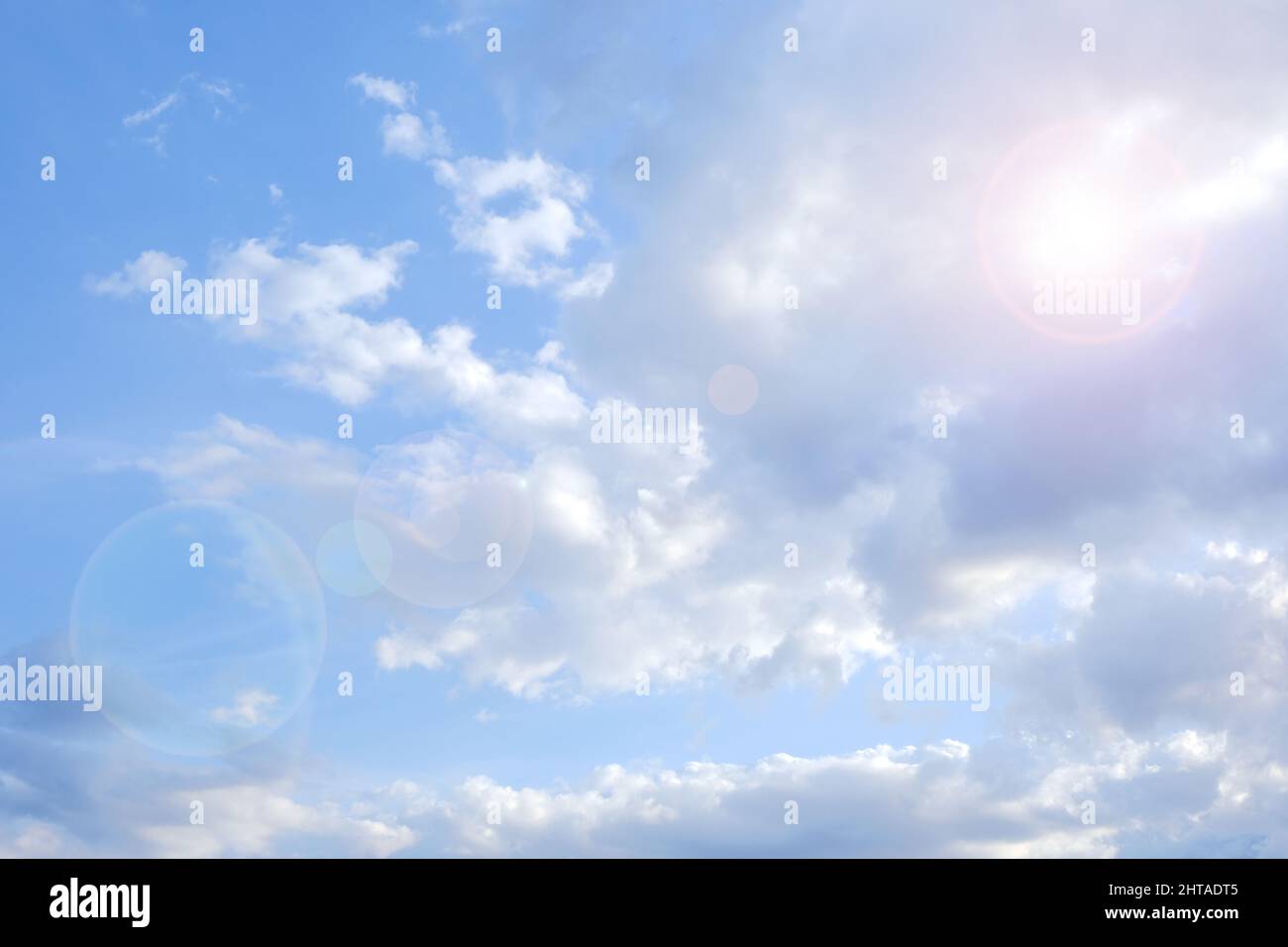 Sky.Heaven background. clouds background.White clouds and sun rays in a ...