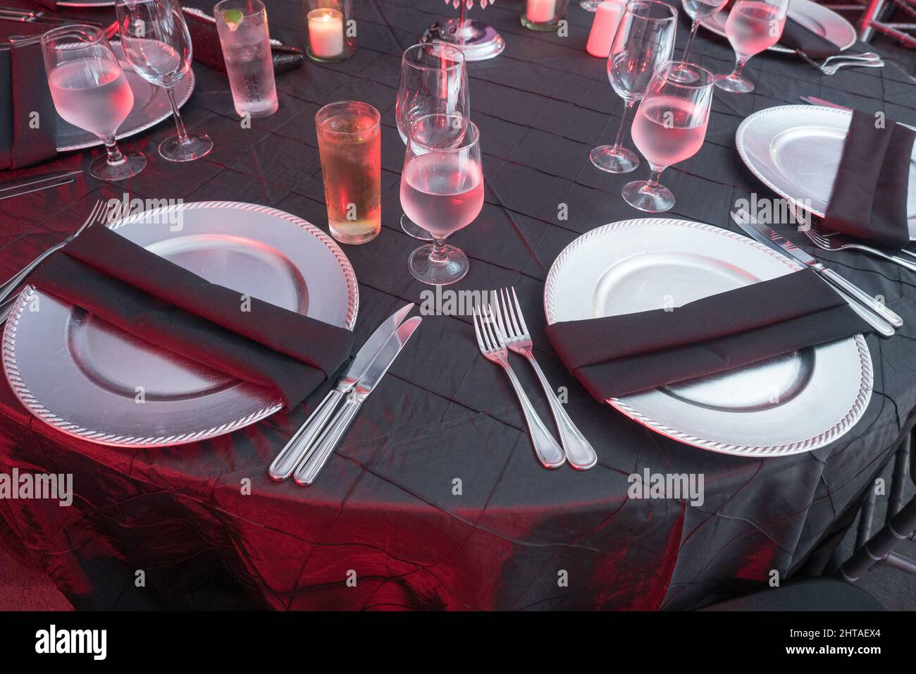 Top view of a beautifully decorated wedding table with black details ...