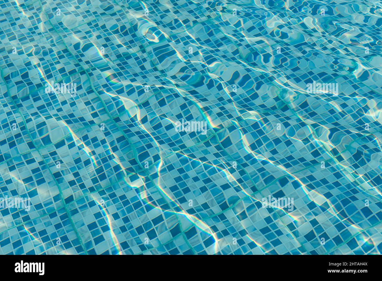 Ripple Water in blue swimming pool Stock Photo - Alamy