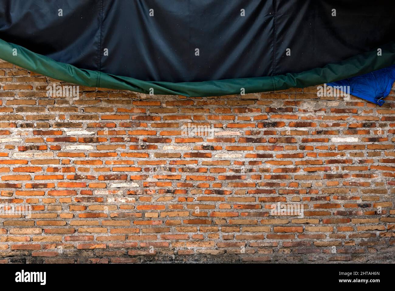 Old brick wall partially covered by awning Stock Photo - Alamy Old brick wall partially covered by awning Stock Photo - Alamy