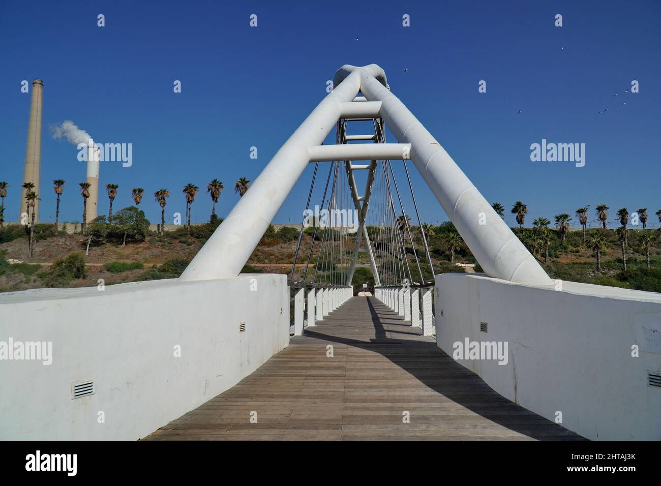 Hadera pedestrian bridge over the river Hadera in Israel Stock Photo ...