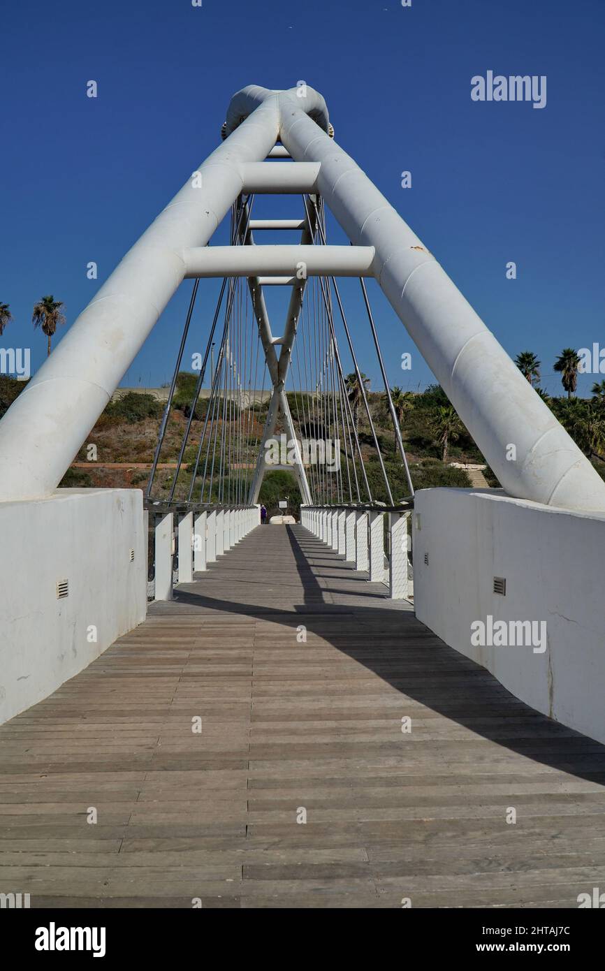 Vertical shot of the Hadera pedestrian bridge over the river Hadera in ...