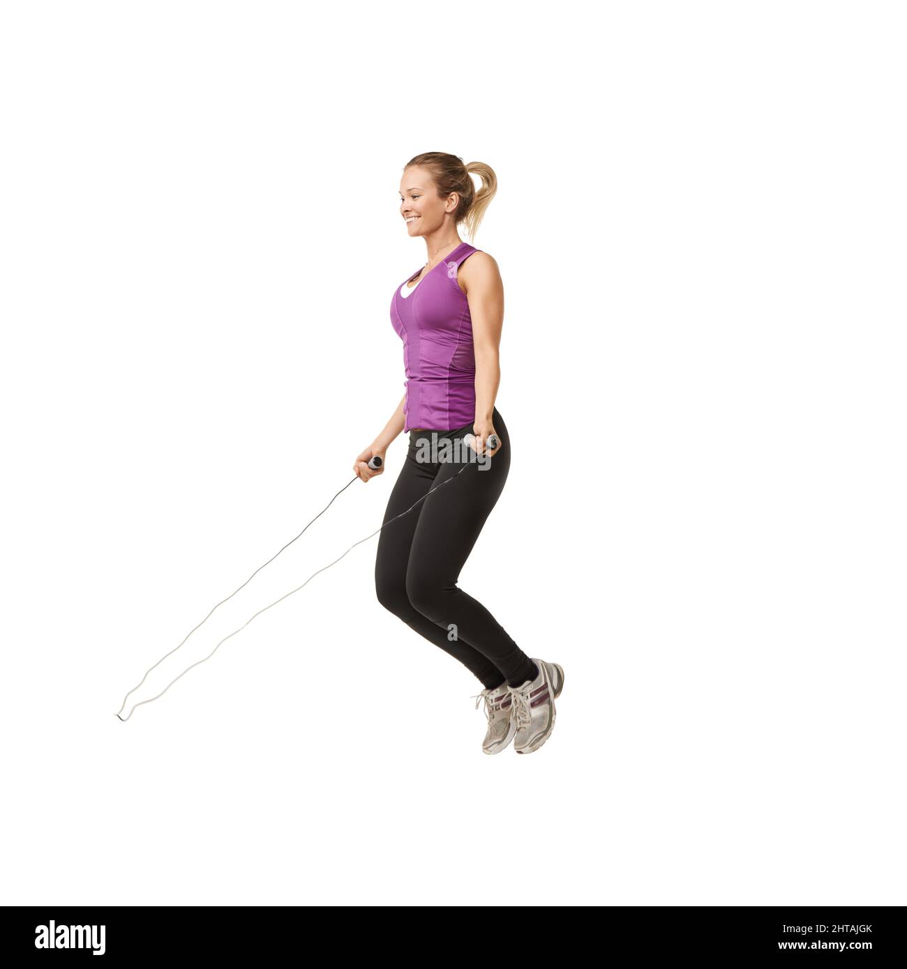 Woman skipping jump rope Cut Out Stock Images & Pictures - Alamy