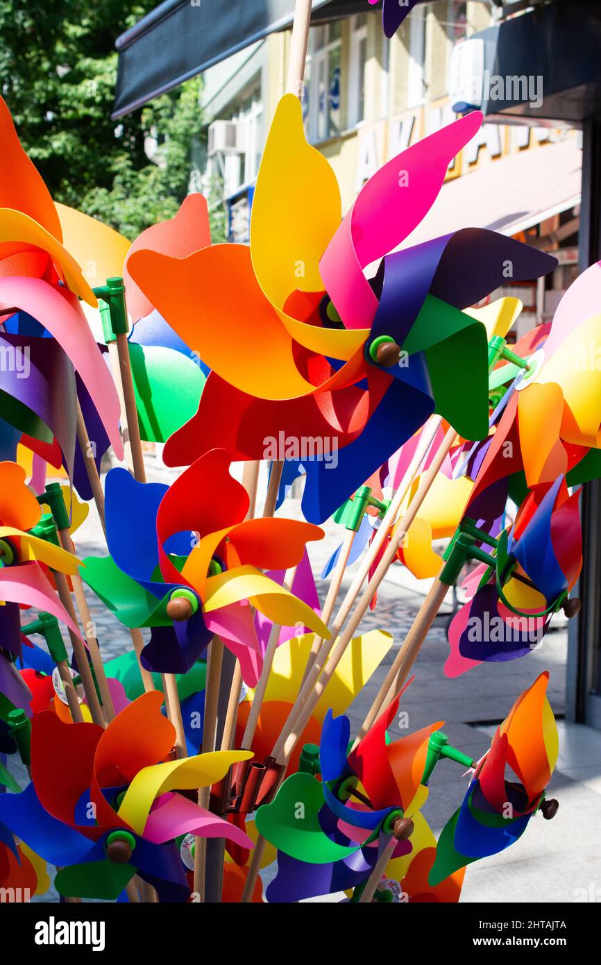 Vertical shot of rainbow pinwheels at an event Stock Photo - Alamy
