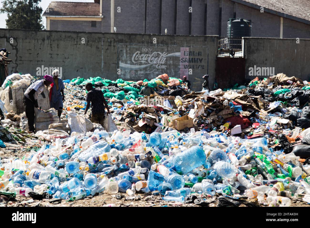 Waste pickers scavenge for recyclables at Dandora Dumpsite.Discussions ...
