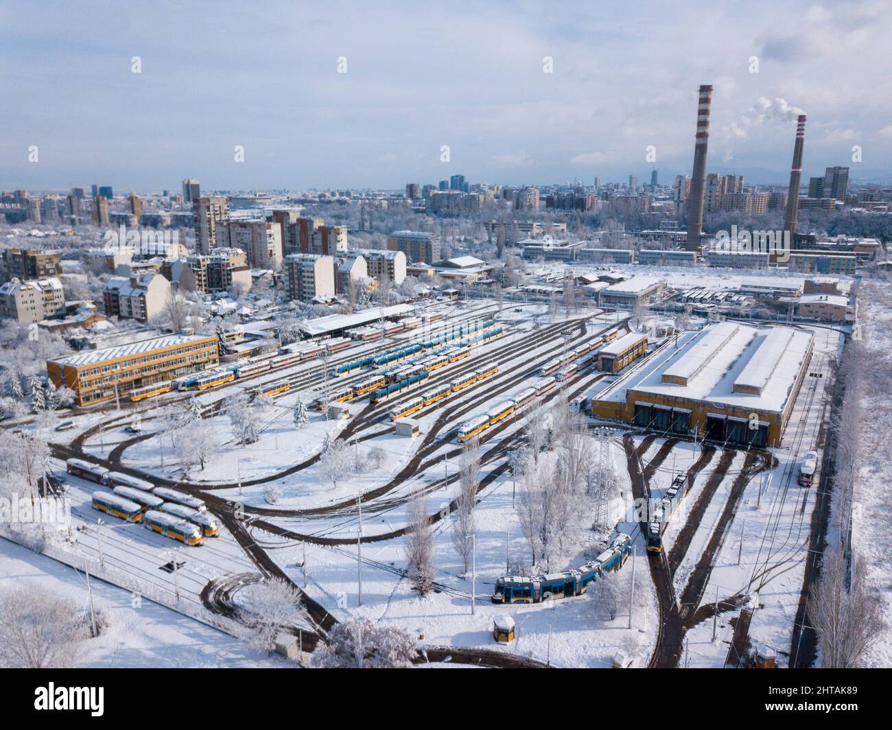 Aerial view of the beautiful city all covered with snow in the cold ...