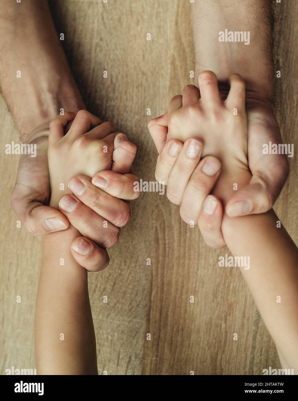 Crime children holding hands hi-res stock photography and images - Alamy