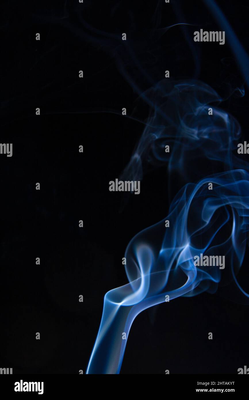 Real colorful smoke on black background. Graphic resource for use with ...