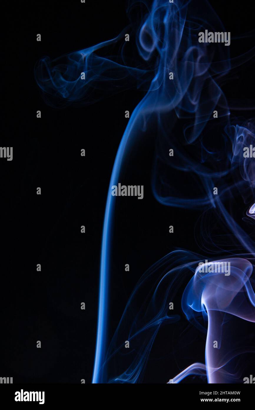 Real colorful smoke on black background. Graphic resource for use with ...
