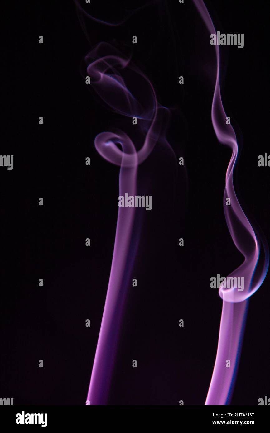 Real colorful smoke on black background. Graphic resource for use with ...
