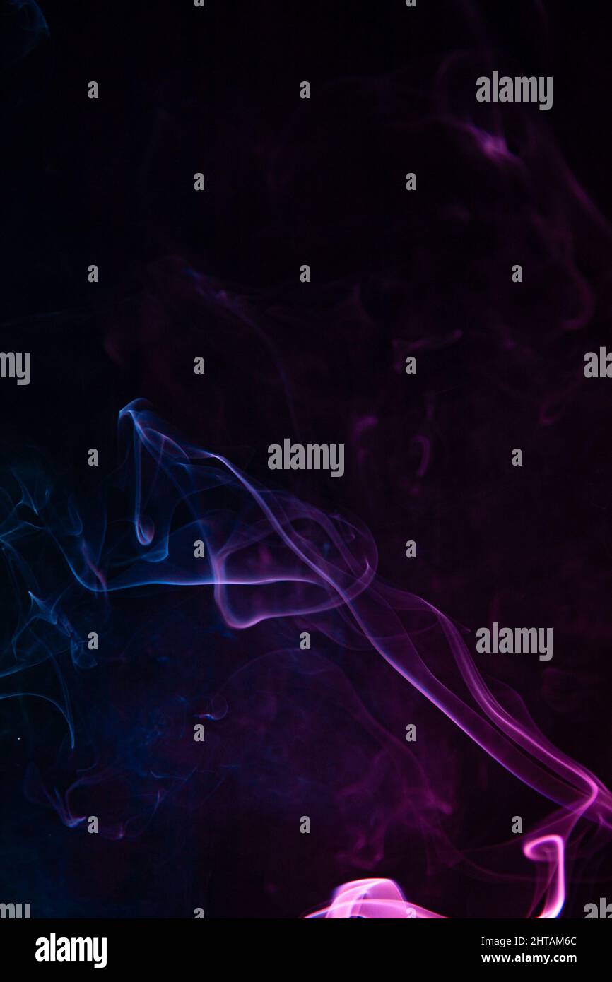 Real colorful smoke on black background. Graphic resource for use with ...