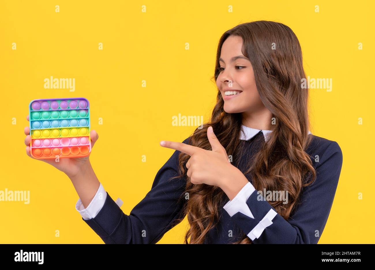 girl with finger game. kid popping anti stress bubble. childhood craze ...