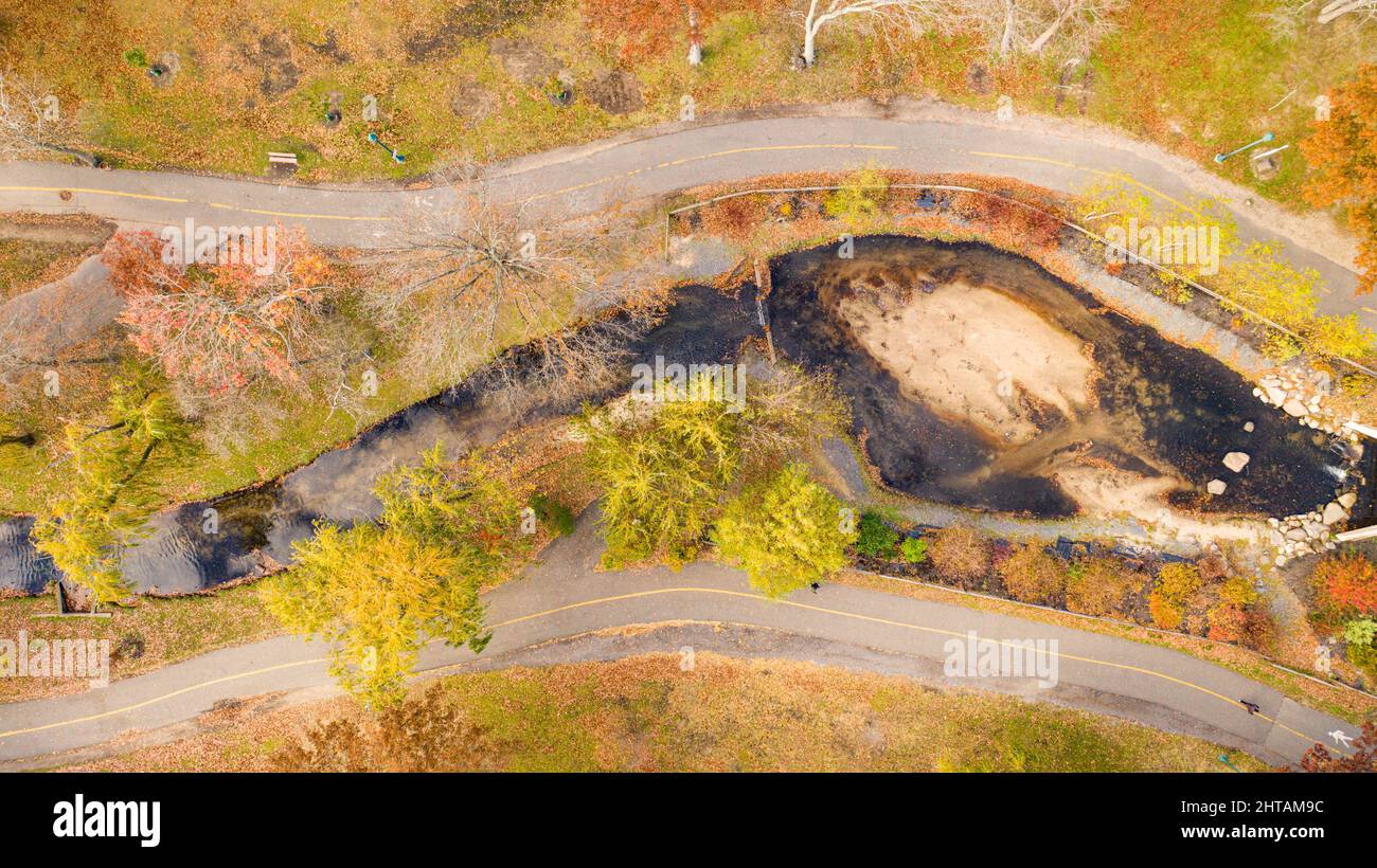 Aerial view above a park during the autumn season with beautiful fall ...