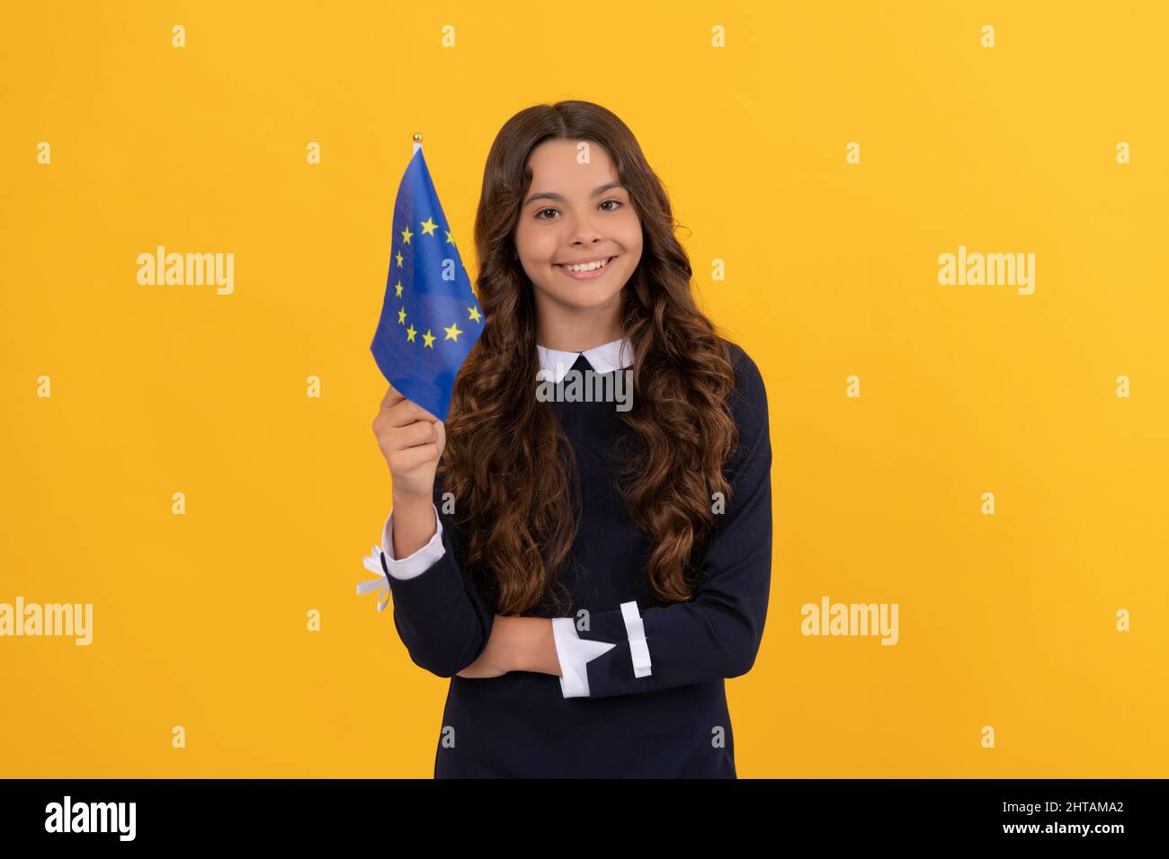 happy child hold european union flag yellow background, european union ...