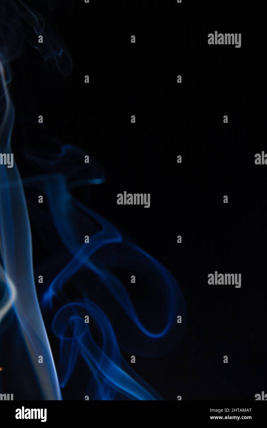 Real colorful smoke on black background. Graphic resource for use with ...