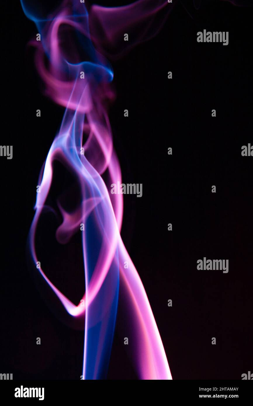 Real colorful smoke on black background. Graphic resource for use with ...
