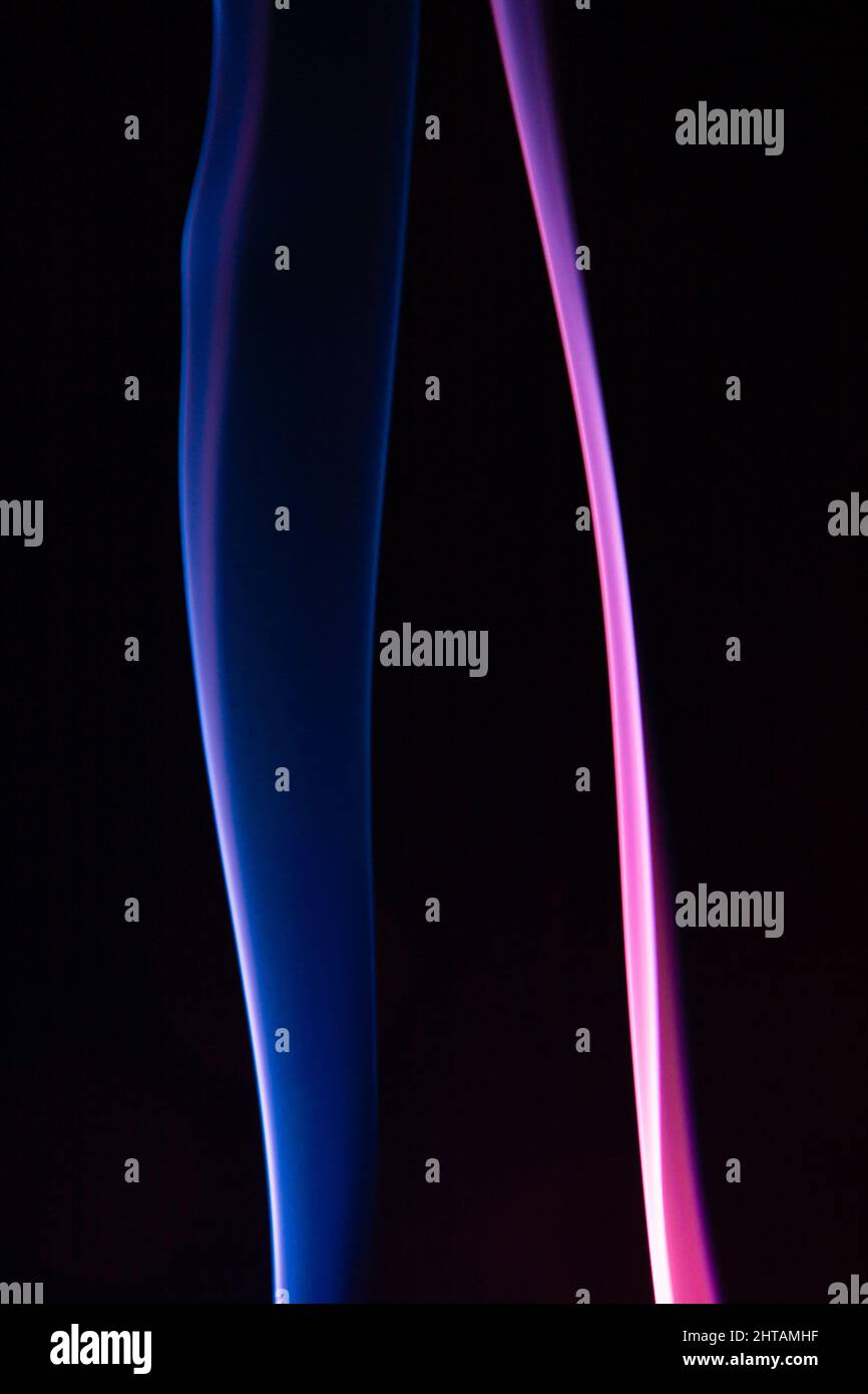 Real colorful smoke on black background Stock Photo - Alamy