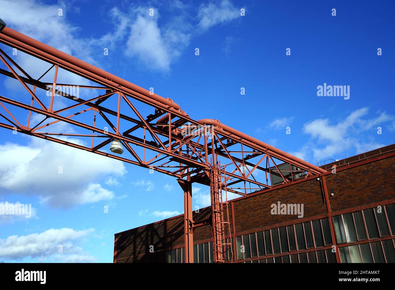 Old steel construction with rusty pipes against a blue background Stock ...