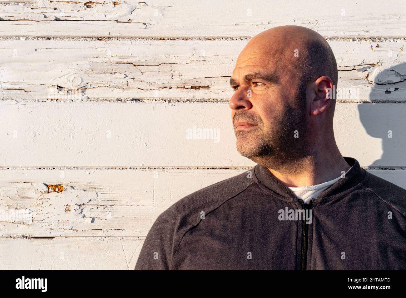 Middle-aged Caucasian man with a beard and shaved hair Stock Photo - Alamy