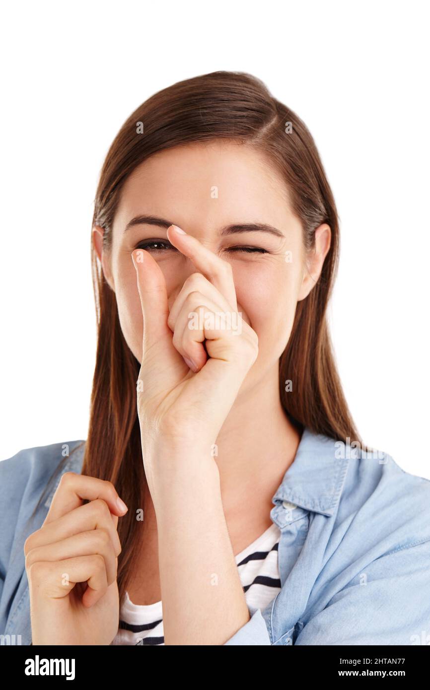 You just need a pinch. Studio shot of a beautiful young woman ...
