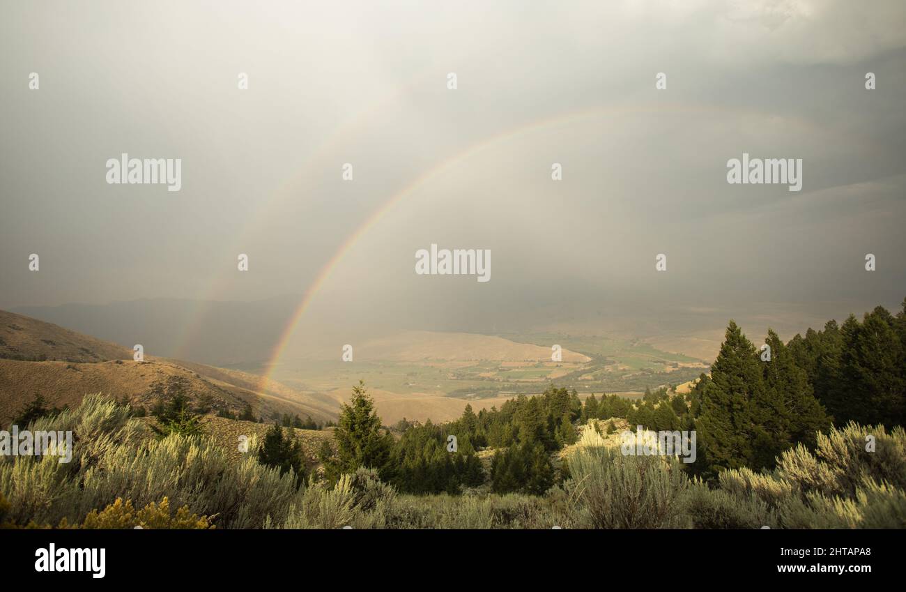 Rainy rainbow monsoon hi-res stock photography and images - Alamy