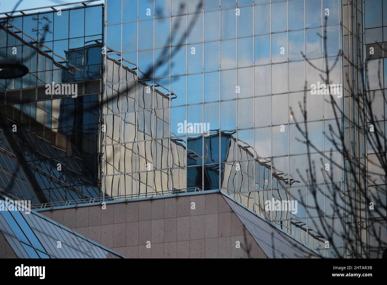 Mirrored building reflects some other buildings Stock Photo - Alamy