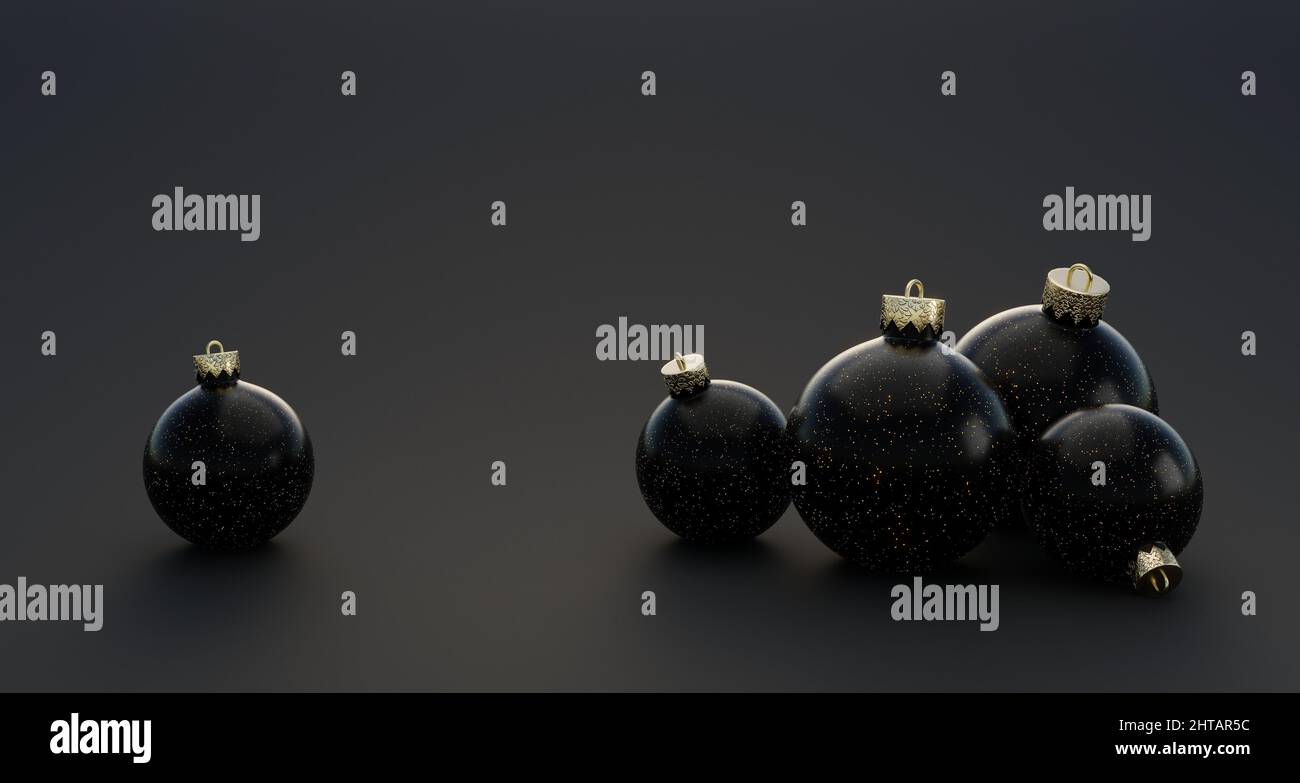 Black Christmas balls with shiny gold tops and glitter on white ...