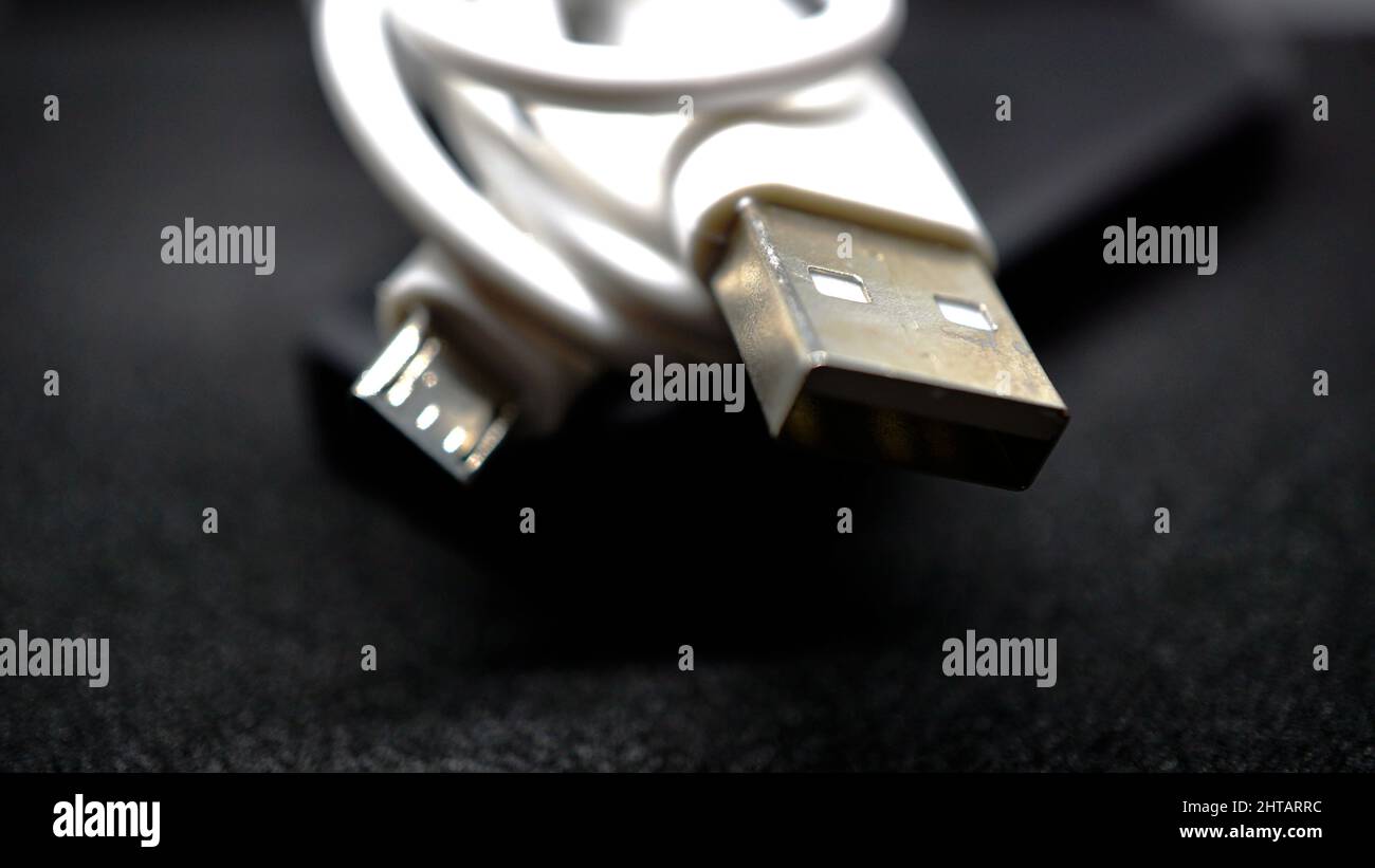 USB cable is white. object photography style Stock Photo - Alamy