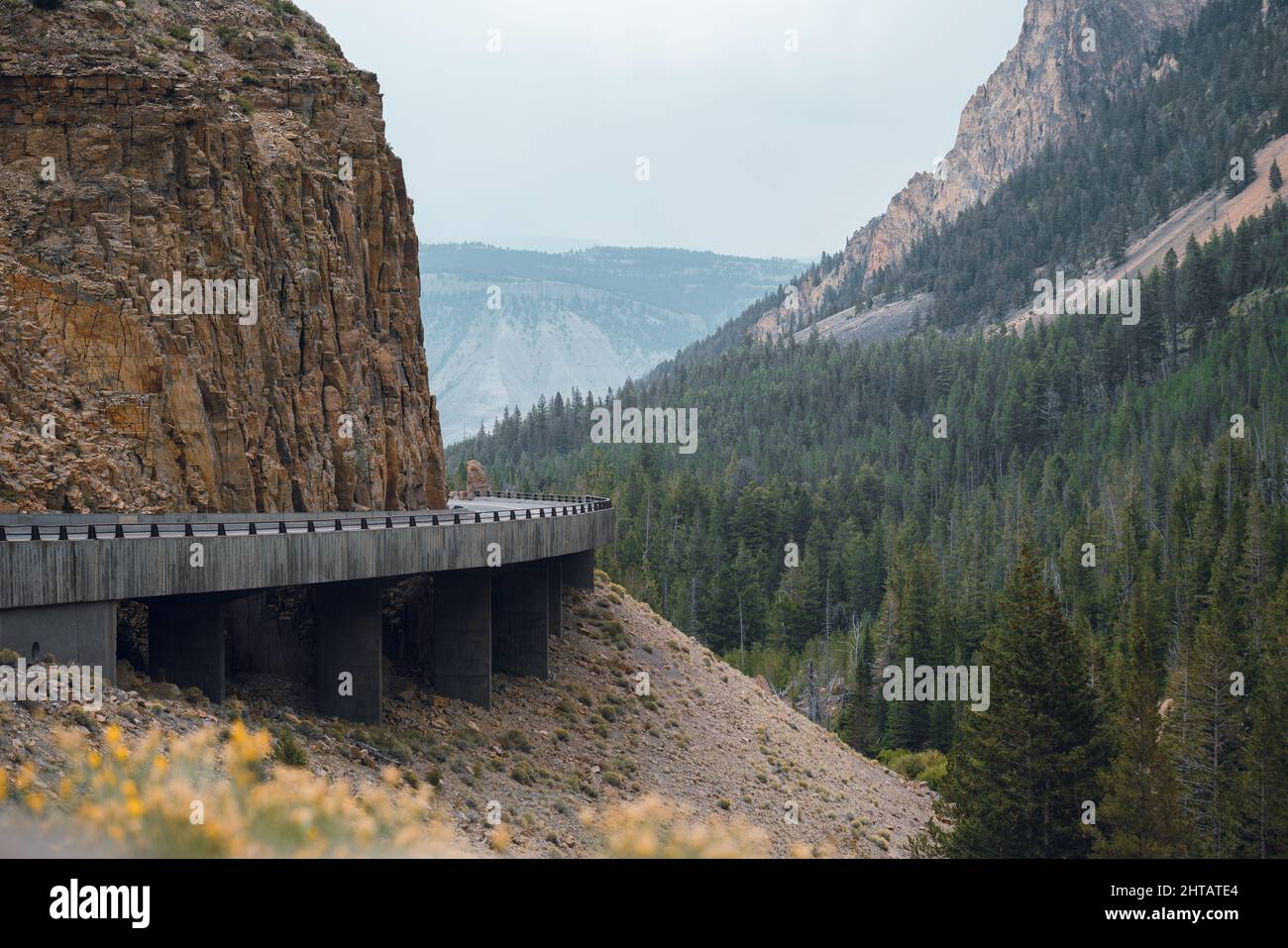 Rural road on the side of a mountain in Yellowstone Stock Photo - Alamy