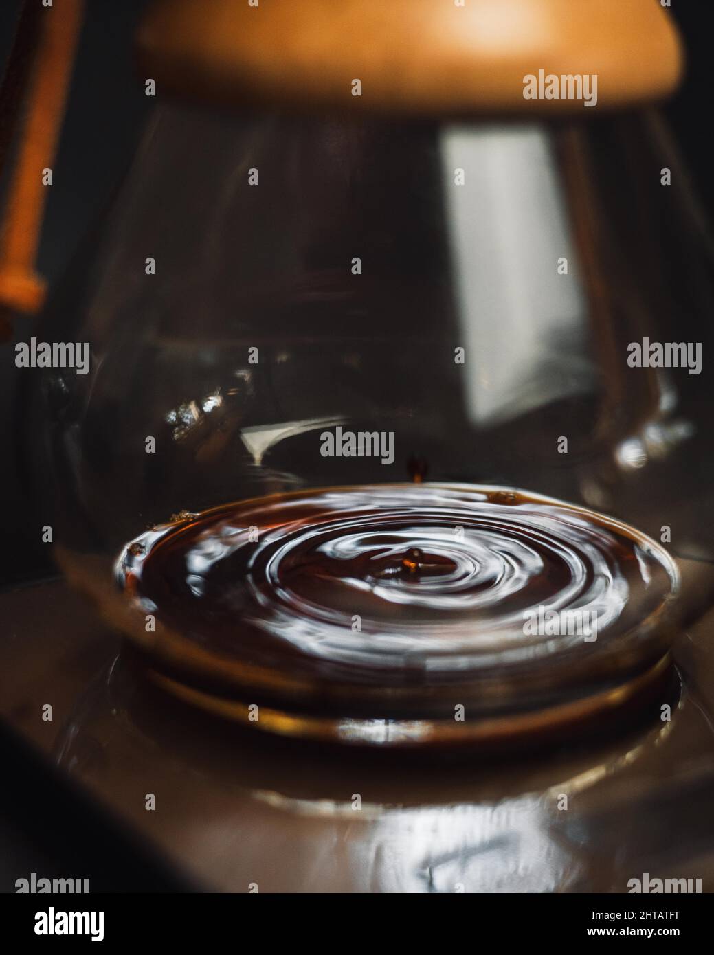 Vertical shot of a coffee dripping into a glass pour over pot Stock ...
