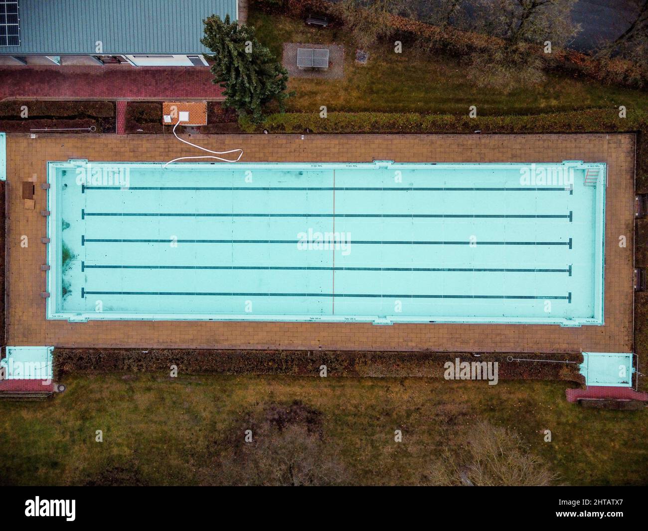 Aerial view of an abandoned swimming pool in autumn Stock Photo - Alamy