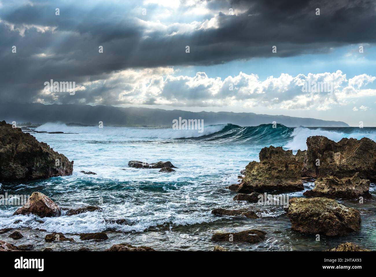 Stormy weather with high Hawaiian waves under the clouds Stock Photo ...