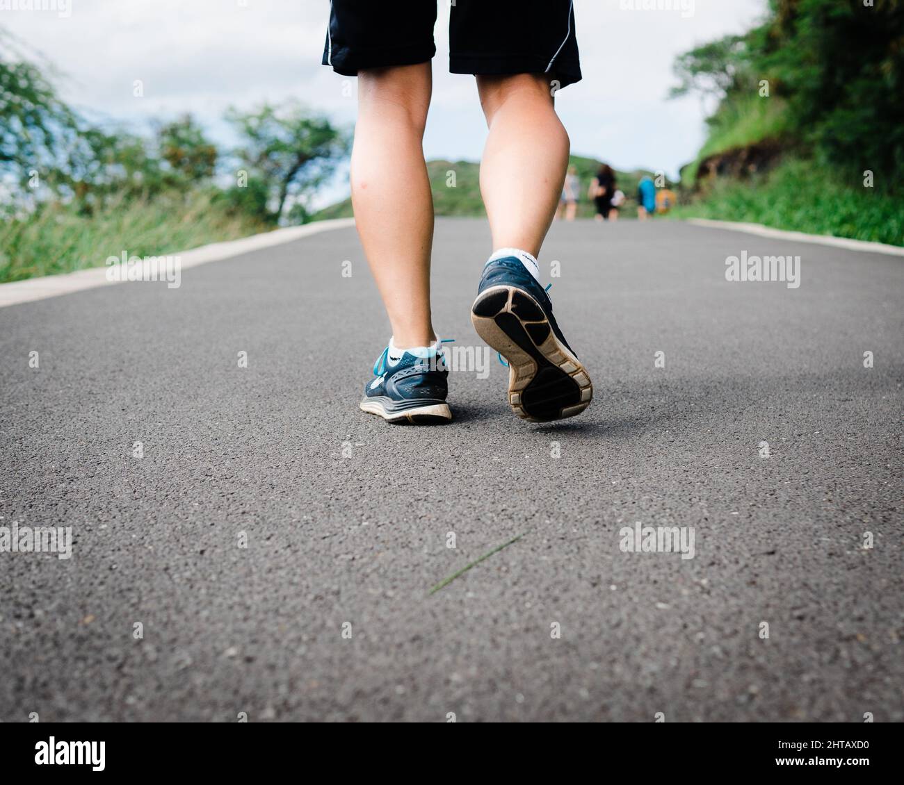 Young mans feet walking away hi-res stock photography and images - Alamy