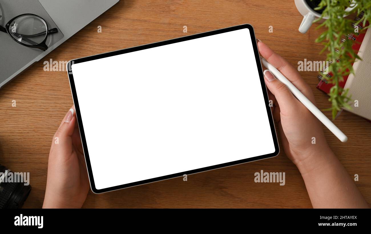 Overhead shot, Graphic designer using digital tablet touchpad white ...
