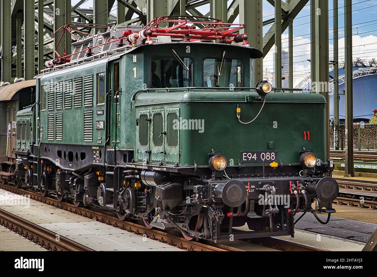 Historic railroad engine on the Hohenzollern Bridge in Cologne, Germany ...