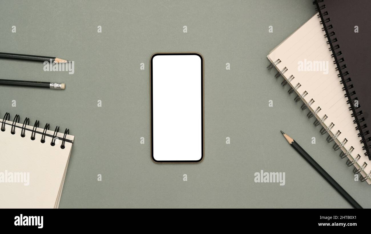 Trendy office table workspace in grey background with smartphone empty ...